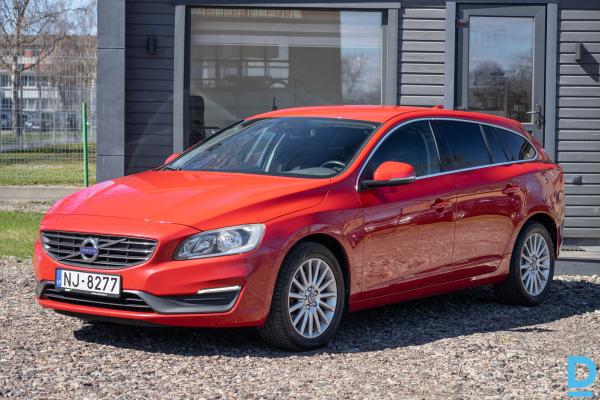 Red Volvo V60 2013 in Liepaja, with an engine capacity of 1.60 L and mileage of 290 thousand km for 6950 €, photo 2 on AUTOMOTO.COM.LV