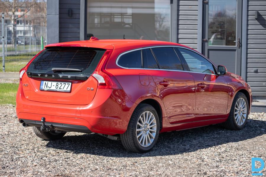 Red Volvo V60 2013 in Liepaja, with an engine capacity of 1.60 L and mileage of 290 thousand km for 6950 €, photo 5 on AUTOMOTO.COM.LV