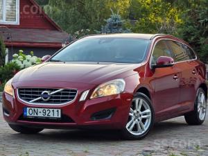 Sarkans Volvo V60 2013 Rīga, ar dzinēja tilpumu 2.00 L un nobraukumu 257 tūkst. km par 5950 €, foto  vietnē AUTOMOTO.COM.LV