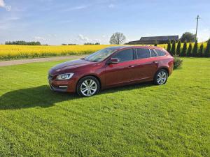 Red Volvo V60 2013 in Kaunas, with an engine capacity of 1.98 L and mileage of 206 thousand km for 6500 €, photo  on AUTOMOTO.COM.LV