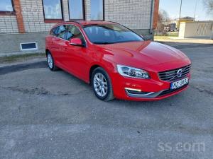 Red Volvo V60 2014 in Talsi, with an engine capacity of 2.00 L and mileage of 299 thousand km for 6500 €, photo 1 on AUTOMOTO.COM.LV