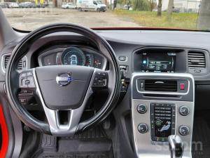 Red Volvo V60 2014 in Talsi, with an engine capacity of 2.00 L and mileage of 299 thousand km for 6500 €, photo 11 on AUTOMOTO.COM.LV