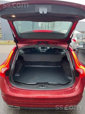 Red Volvo V60 2014 in Riga, with an engine capacity of 2.00 L and mileage of 286 thousand km for 4700 €, photo 12 on AUTOMOTO.COM.LV