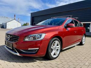 Red Volvo V60 2014 in Kaunas, with an engine capacity of 2.40 L and mileage of 277 thousand km for 7390 €, photo 4 on AUTOMOTO.COM.LV