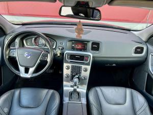 Red Volvo V60 2014 in Kaunas, with an engine capacity of 2.40 L and mileage of 277 thousand km for 7390 €, photo 20 on AUTOMOTO.COM.LV