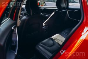 Red Volvo V60 2014 in Riga, with an engine capacity of 2.40 L and mileage of 267 thousand km for 6200 €, photo 14 on AUTOMOTO.COM.LV