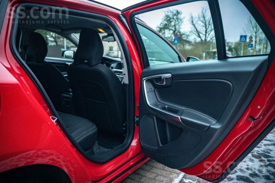 Red Volvo V60 2015 in Riga, with an engine capacity of 2.00 L and mileage of 0 thousand km for 5990 €, photo 12 on AUTOMOTO.COM.LV
