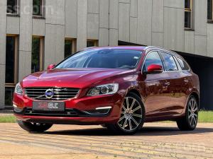 Red Volvo V60 2015 in Riga, with an engine capacity of 2.40 L and mileage of 194 thousand km for 12300 €, photo  on AUTOMOTO.COM.LV