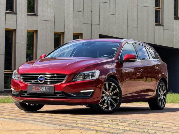 Red Volvo V60 2015 in Riga, with an engine capacity of 2.40 L and mileage of 194 thousand km for 12300 €, photo 1 on AUTOMOTO.COM.LV