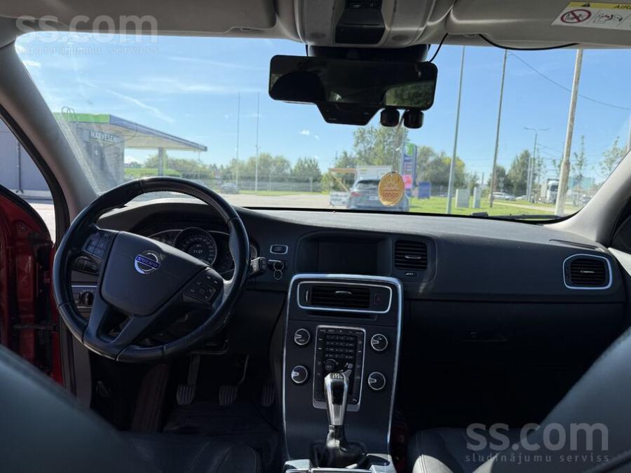 Red Volvo V60 2016 in Riga, with an engine capacity of 2.00 L and mileage of 241 thousand km for 7200 €, photo 6 on AUTOMOTO.COM.LV