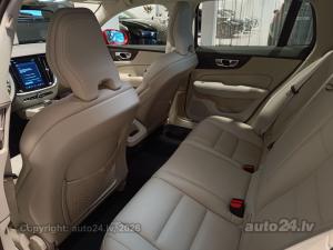 Red Volvo V60 2024 in Tallinn, with an engine capacity of 2.00 L and mileage of 66 thousand km for 34990 €, photo 9 on AUTOMOTO.COM.LV