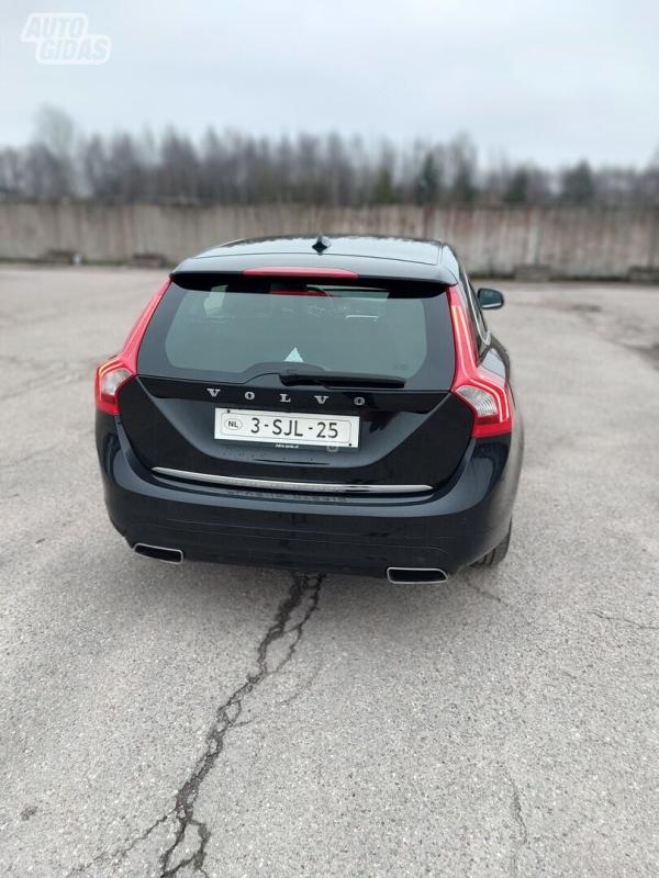 Volvo V60 2013 in Panevezys, with an engine capacity of 2.40 L and mileage of 335 thousand km for 6350 €, photo 3 on AUTOMOTO.COM.LV