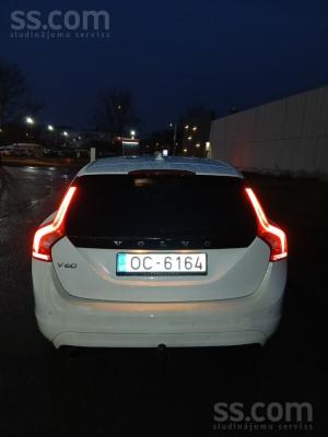 White Volvo V60 2014 in Riga, with an engine capacity of 1.60 L and mileage of 0 thousand km for 4999 €, photo 2 on AUTOMOTO.COM.LV