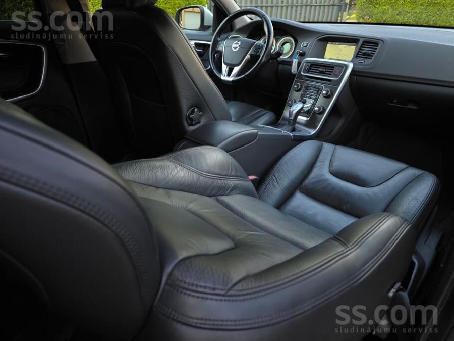 White Volvo V60 2012 in Riga, with an engine capacity of 2.00 L and mileage of 292 thousand km for 6350 €, photo 23 on AUTOMOTO.COM.LV