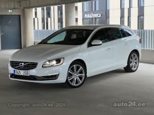 White Volvo V60 2013 in Tallinn, with an engine capacity of 2.40 L and mileage of 199 thousand km for 10299 €, photo 1 on AUTOMOTO.COM.LV