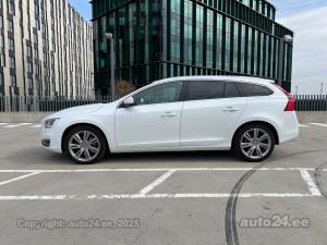 White Volvo V60 2013 in Tallinn, with an engine capacity of 2.40 L and mileage of 199 thousand km for 10299 €, photo 5 on AUTOMOTO.COM.LV