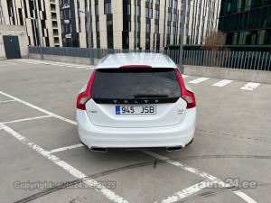White Volvo V60 2013 in Tallinn, with an engine capacity of 2.40 L and mileage of 199 thousand km for 10299 €, photo 7 on AUTOMOTO.COM.LV