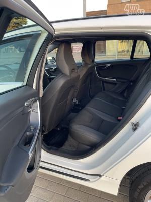 White Volvo V60 2013 in Marijampole, with an engine capacity of 1.60 L and mileage of 287 thousand km for 5700 €, photo 14 on AUTOMOTO.COM.LV