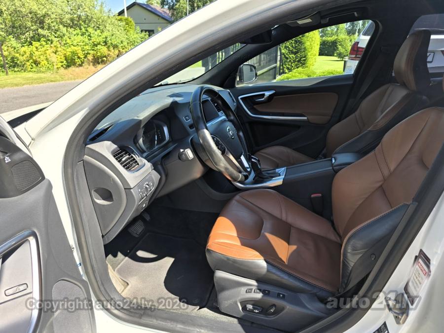 White Volvo V60 2013 in Tartu, with an engine capacity of 2.40 L and mileage of 285 thousand km for 9700 €, photo 18 on AUTOMOTO.COM.LV