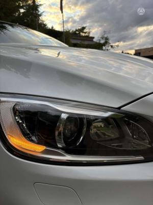 White Volvo V60 2013 in Vilnius, with an engine capacity of 2.40 L and mileage of 254 thousand km for 7600 €, photo 11 on AUTOMOTO.COM.LV
