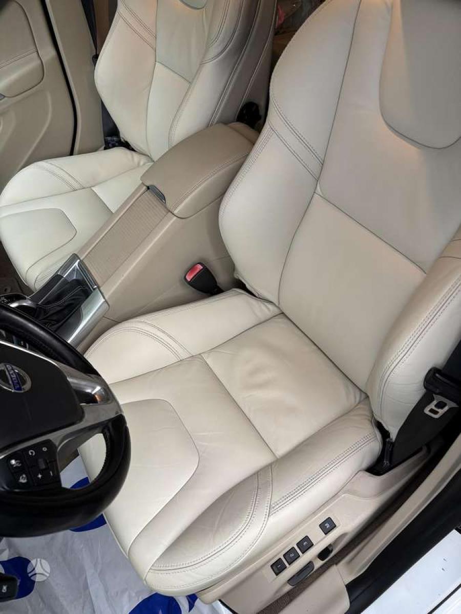 White Volvo V60 2013 in Vilnius, with an engine capacity of 2.40 L and mileage of 254 thousand km for 7600 €, photo 16 on AUTOMOTO.COM.LV