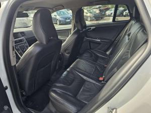 White Volvo V60 2013 in Ukmerge, with an engine capacity of 1.56 L and mileage of 200 thousand km for 3450 €, photo 9 on AUTOMOTO.COM.LV