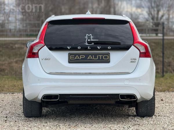 White Volvo V60 2014 in Jelgava, with an engine capacity of 2.40 L and mileage of 0 thousand km for 9490 €, photo 4 on AUTOMOTO.COM.LV