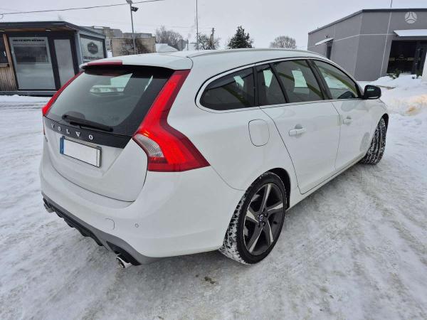 White Volvo V60 2014 in Raseiniai, with an engine capacity of 1.98 L and mileage of 257 thousand km for 7300 €, photo 10 on AUTOMOTO.COM.LV