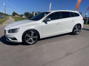 White Volvo V60 2014 in Kaunas, with an engine capacity of 1.96 L and mileage of 268 thousand km for 6950 €, photo 4 on AUTOMOTO.COM.LV