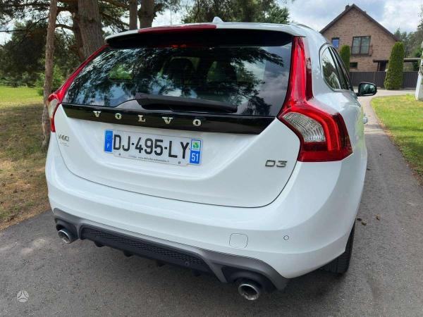 White Volvo V60 2014 in Vilnius, with an engine capacity of 1.98 L and mileage of 285 thousand km for 7490 €, photo 9 on AUTOMOTO.COM.LV