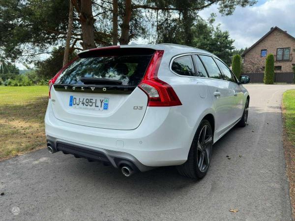 White Volvo V60 2014 in Vilnius, with an engine capacity of 1.98 L and mileage of 285 thousand km for 7490 €, photo 10 on AUTOMOTO.COM.LV