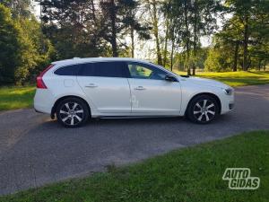 White Volvo V60 2014 in Vilnius, with an engine capacity of 2.40 L and mileage of 260 thousand km for 7800 €, photo 8 on AUTOMOTO.COM.LV
