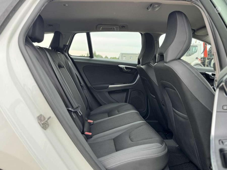 White Volvo V60 2014 in Siauliai, with an engine capacity of 1.97 L and mileage of 388 thousand km for 6100 €, photo 16 on AUTOMOTO.COM.LV