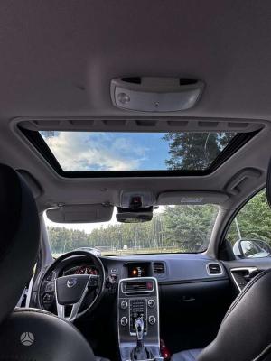 White Volvo V60 2015 in Pasvalys, with an engine capacity of 1.56 L and mileage of 150 thousand km for 7300 €, photo 16 on AUTOMOTO.COM.LV