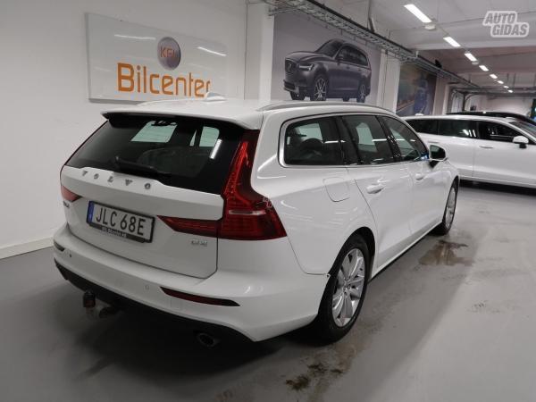 White Volvo V60 2021 in Kaunas, with an engine capacity of 0.00 L and mileage of 80 thousand km for 29341 €, photo 6 on AUTOMOTO.COM.LV