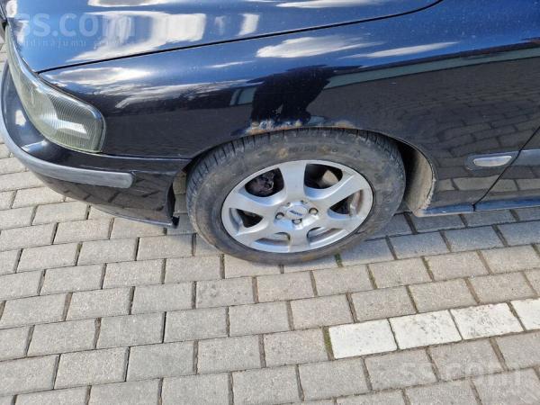 Black Volvo V70 2005 in Riga, with an engine capacity of 2.40 L and mileage of 310 thousand km for 800 €, photo 4 on AUTOMOTO.COM.LV
