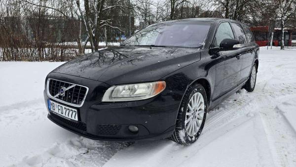 Black Volvo V70 2007 in Vilnius, with an engine capacity of 2.40 L and mileage of 336 thousand km for 3549 €, photo 4 on AUTOMOTO.COM.LV