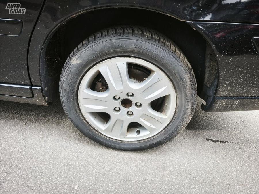 Black Volvo V70 2007 in Kaunas, with an engine capacity of 2.40 L and mileage of 245 thousand km for 900 €, photo 13 on AUTOMOTO.COM.LV