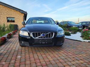 Black Volvo V70 2012 in Vilnius, with an engine capacity of 2.00 L and mileage of 292 thousand km for 5499 €, photo 3 on AUTOMOTO.COM.LV