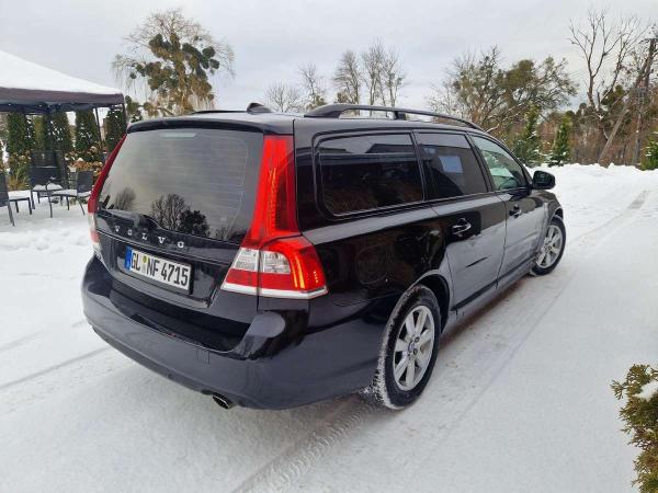 Black Volvo V70 2014 in Prienai, with an engine capacity of 1.98 L and mileage of 269 thousand km for 6499 €, photo 3 on AUTOMOTO.COM.LV