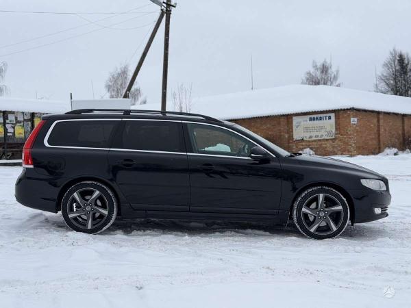 Black Volvo V70 2014 in Utena, with an engine capacity of 1.98 L and mileage of 258 thousand km for 8750 €, photo 8 on AUTOMOTO.COM.LV