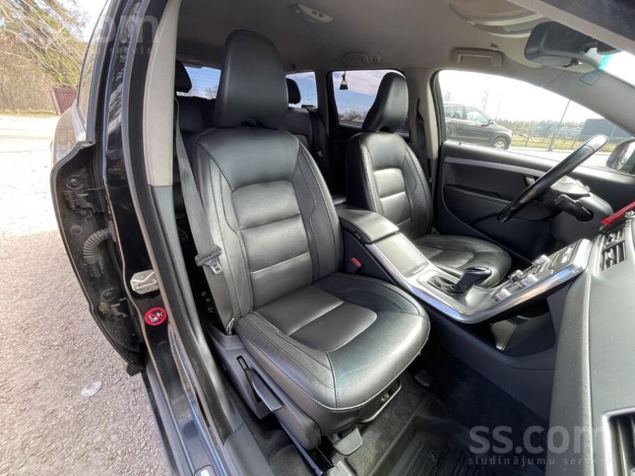 Melns Volvo V70 2014 Rīga, ar dzinēja tilpumu 2.00 L un nobraukumu 259 tūkst. km par 7290 €, foto 18 vietnē AUTOMOTO.COM.LV
