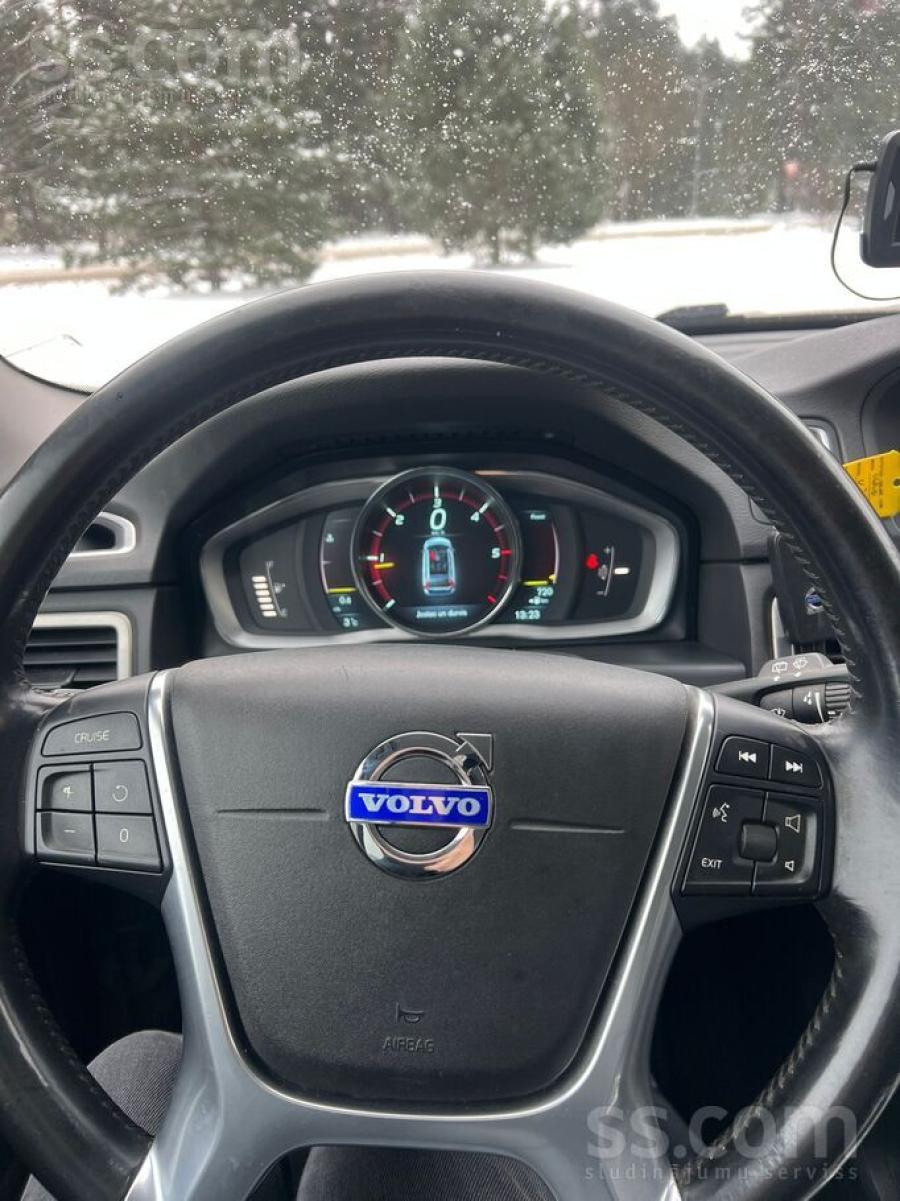 Black Volvo V70 2014 in Jekabpils, with an engine capacity of 2.00 L and mileage of 180 thousand km for 6300 €, photo 7 on AUTOMOTO.COM.LV