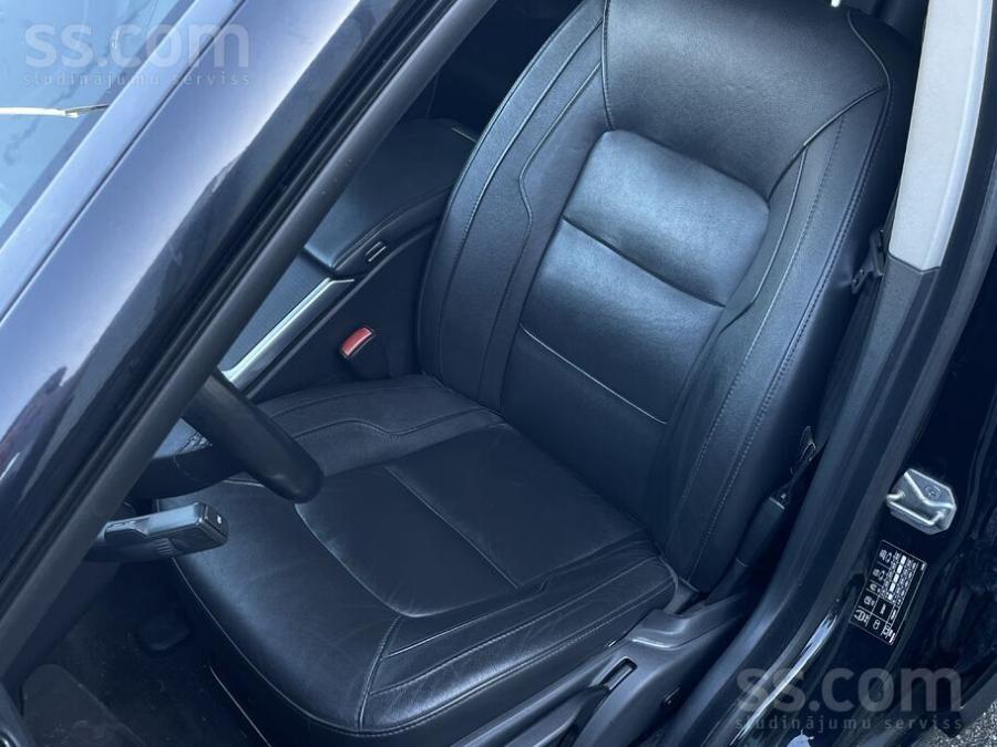 Melns Volvo V70 2015 Liepāja, ar dzinēja tilpumu 2.00 L un nobraukumu 270 tūkst. km par 7900 €, foto 17 vietnē AUTOMOTO.COM.LV