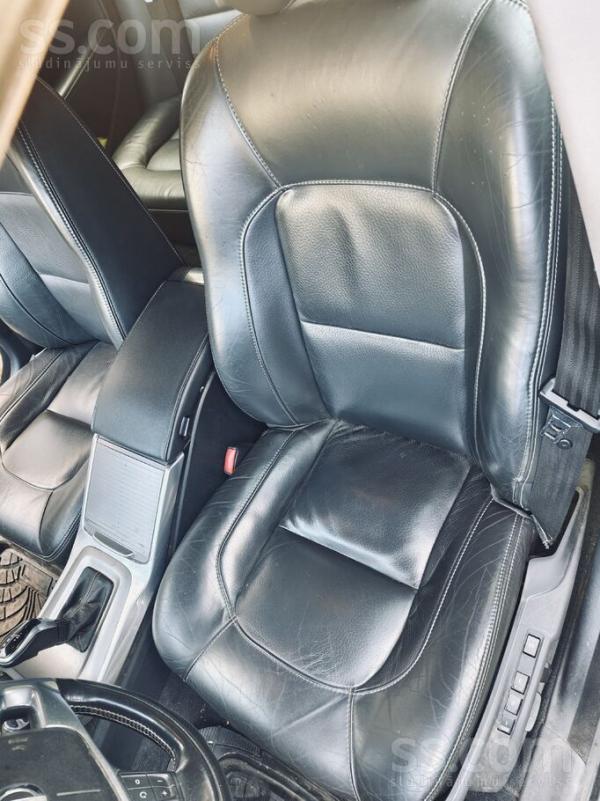 Black Volvo V70 2015 in Riga, with an engine capacity of 2.00 L and mileage of 136 thousand km for 6950 €, photo 10 on AUTOMOTO.COM.LV