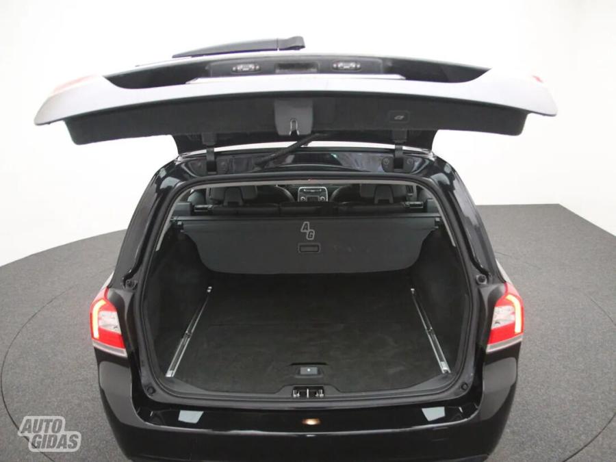Black Volvo V70 2016 in Vilnius, with an engine capacity of 2.00 L and mileage of 294 thousand km for 9299 €, photo 37 on AUTOMOTO.COM.LV