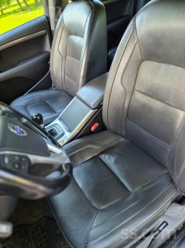 Blue Volvo V70 2015 in Ogre, with an engine capacity of 1.60 L and mileage of 293 thousand km for 5800 €, photo 9 on AUTOMOTO.COM.LV