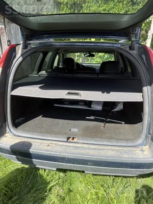Zils Volvo V70 2000 Rīga, ar dzinēja tilpumu 2.50 L un nobraukumu 590 tūkst. km par 950 €, foto 10 vietnē AUTOMOTO.COM.LV