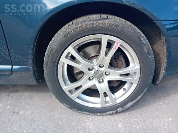 Blue Volvo V70 2010 in Riga, with an engine capacity of 2.40 L and mileage of 280 thousand km for 5350 €, photo 5 on AUTOMOTO.COM.LV