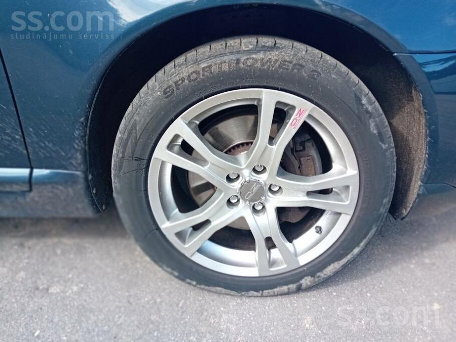 Blue Volvo V70 2010 in Riga, with an engine capacity of 2.40 L and mileage of 280 thousand km for 5350 €, photo 6 on AUTOMOTO.COM.LV